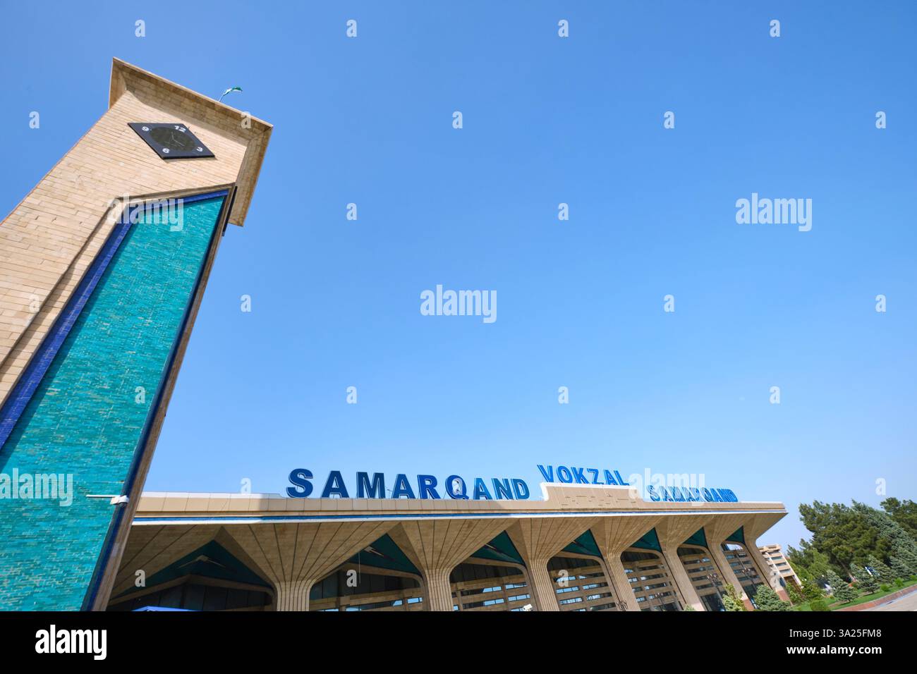 Exterior facade of the modern building with clock tower. At the train ...
