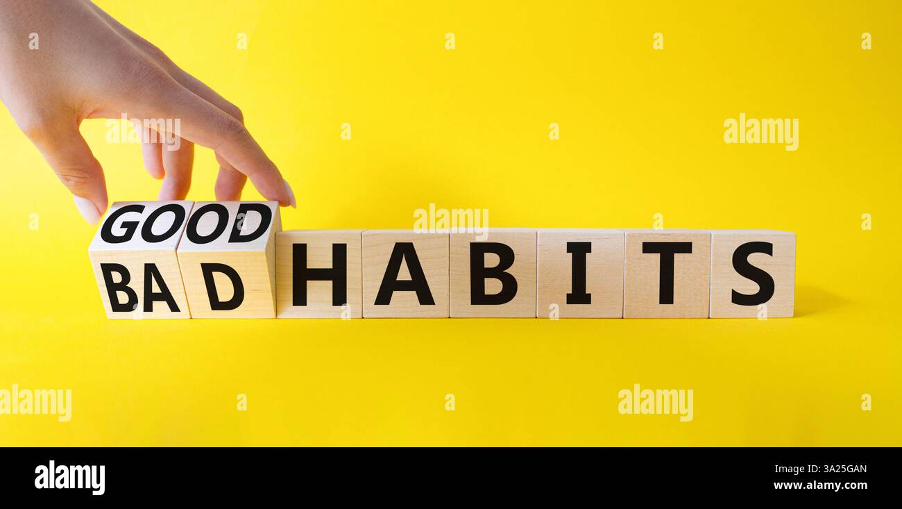 Good and bad Habits symbol. Businessman hand Turnes wooden cubes and ...
