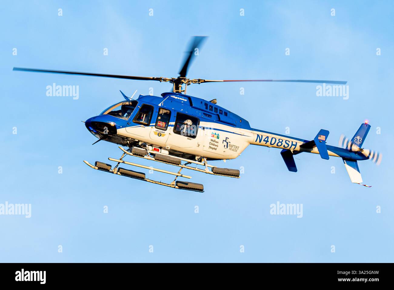 Life Flight medical emergency helicopter in flight approaching a ...