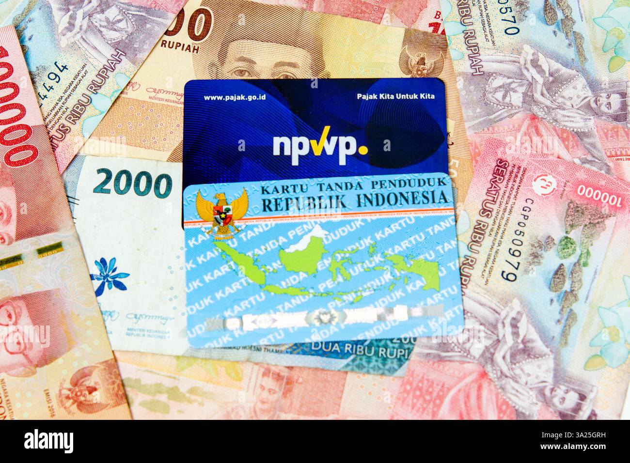 Indonesian tax card (Kartu NPWP) and identity card on Indonesian ...