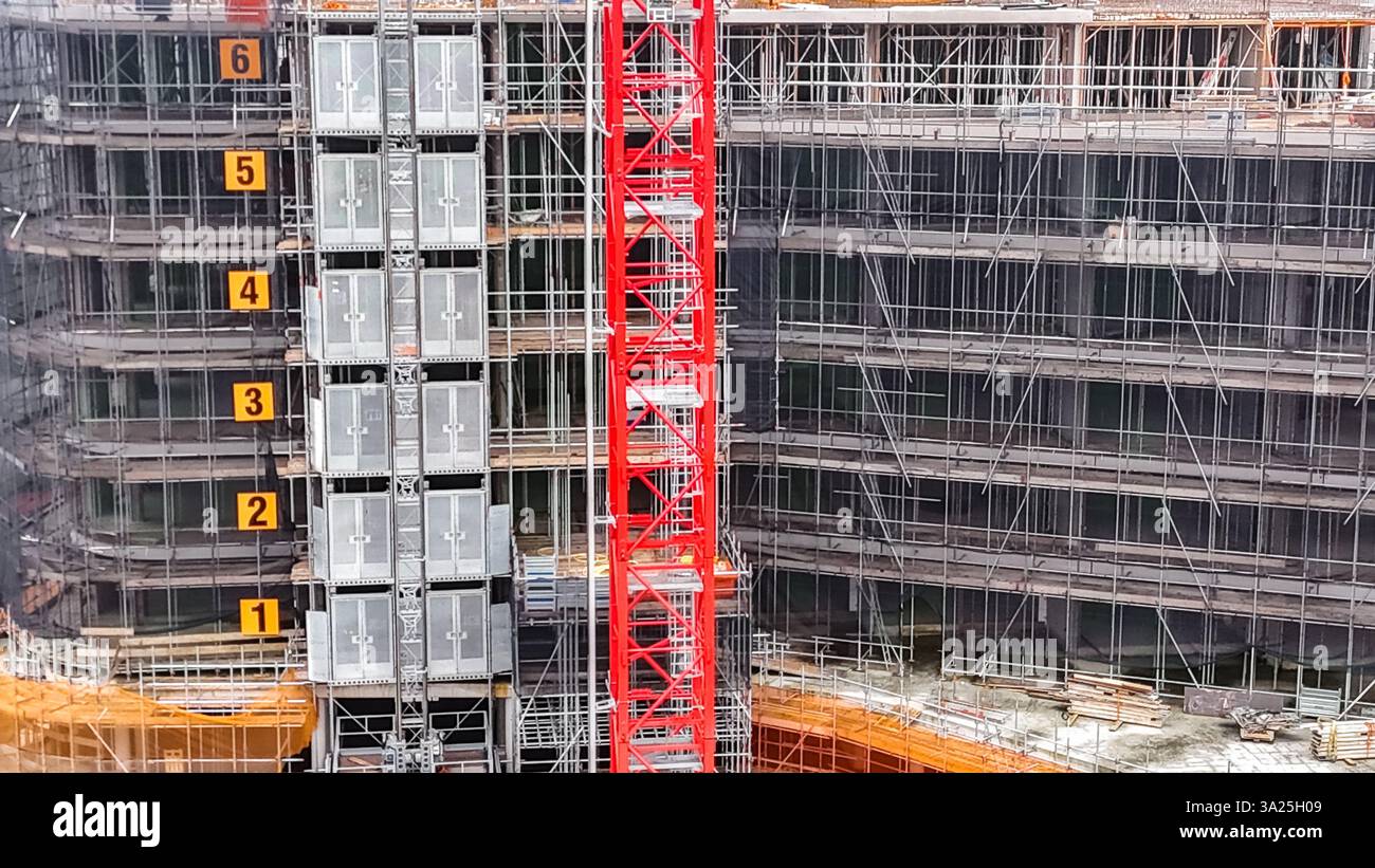 Construction site with crane view, modern residential apartment ...