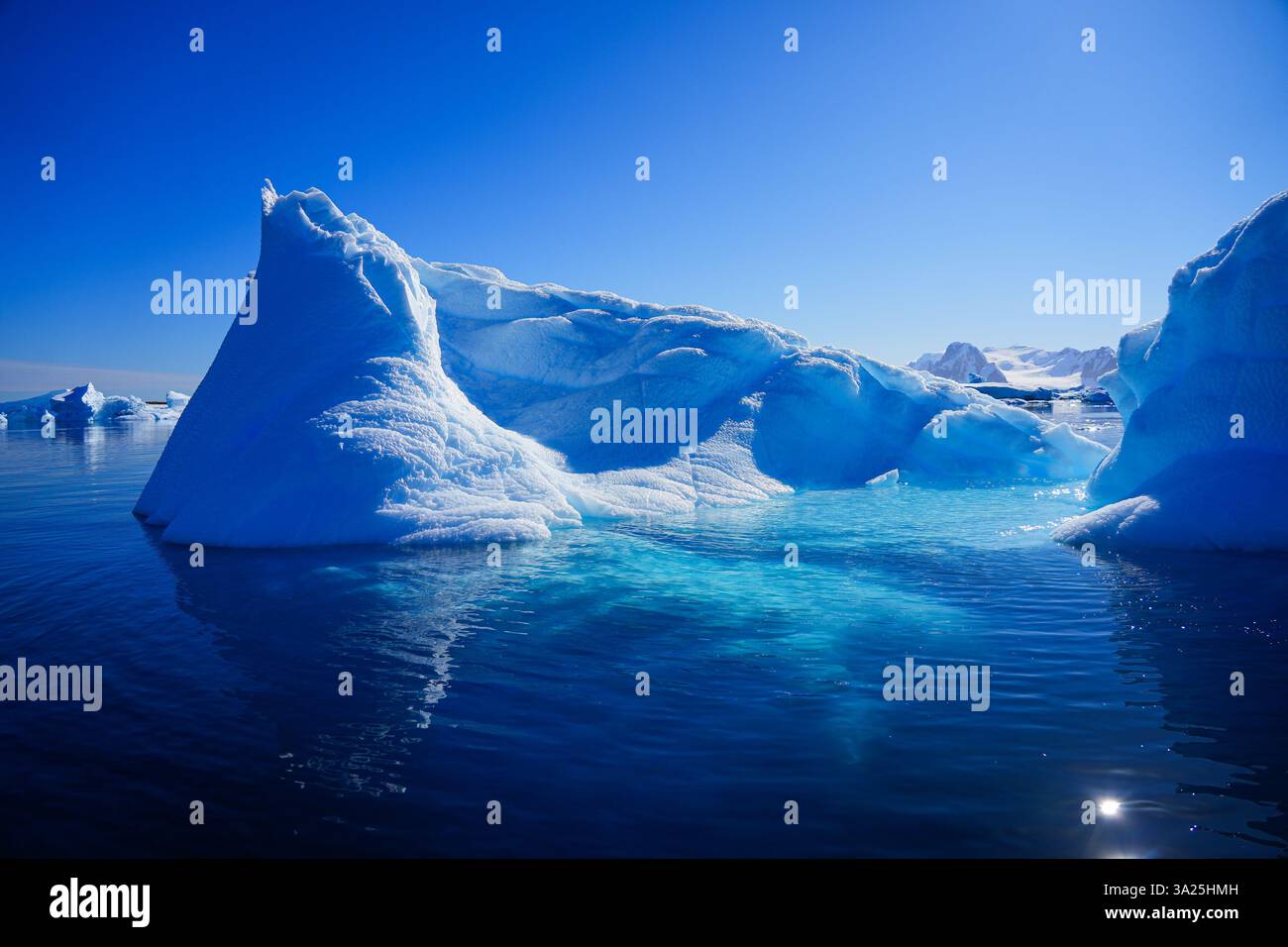 Floating iceberg in the Argentine Islands along the Antarctic Peninsula ...