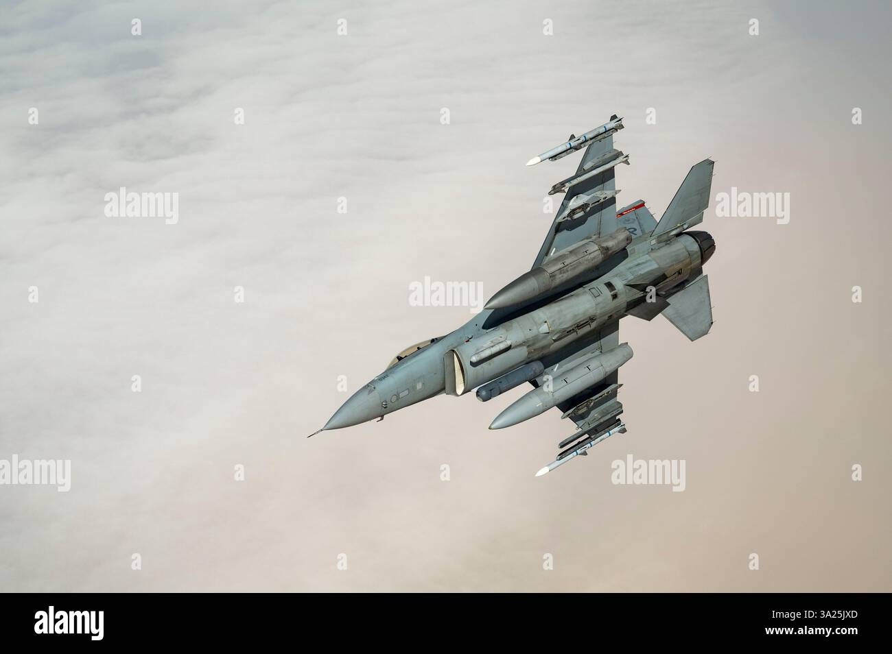 A U.S. Air Force F-16 Fighting Falcon departs after being refueled over ...