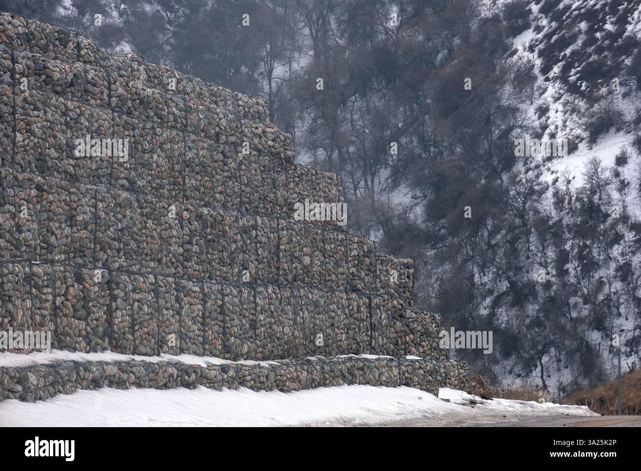 Gabion wall built to protect road from landslides made of natural ...