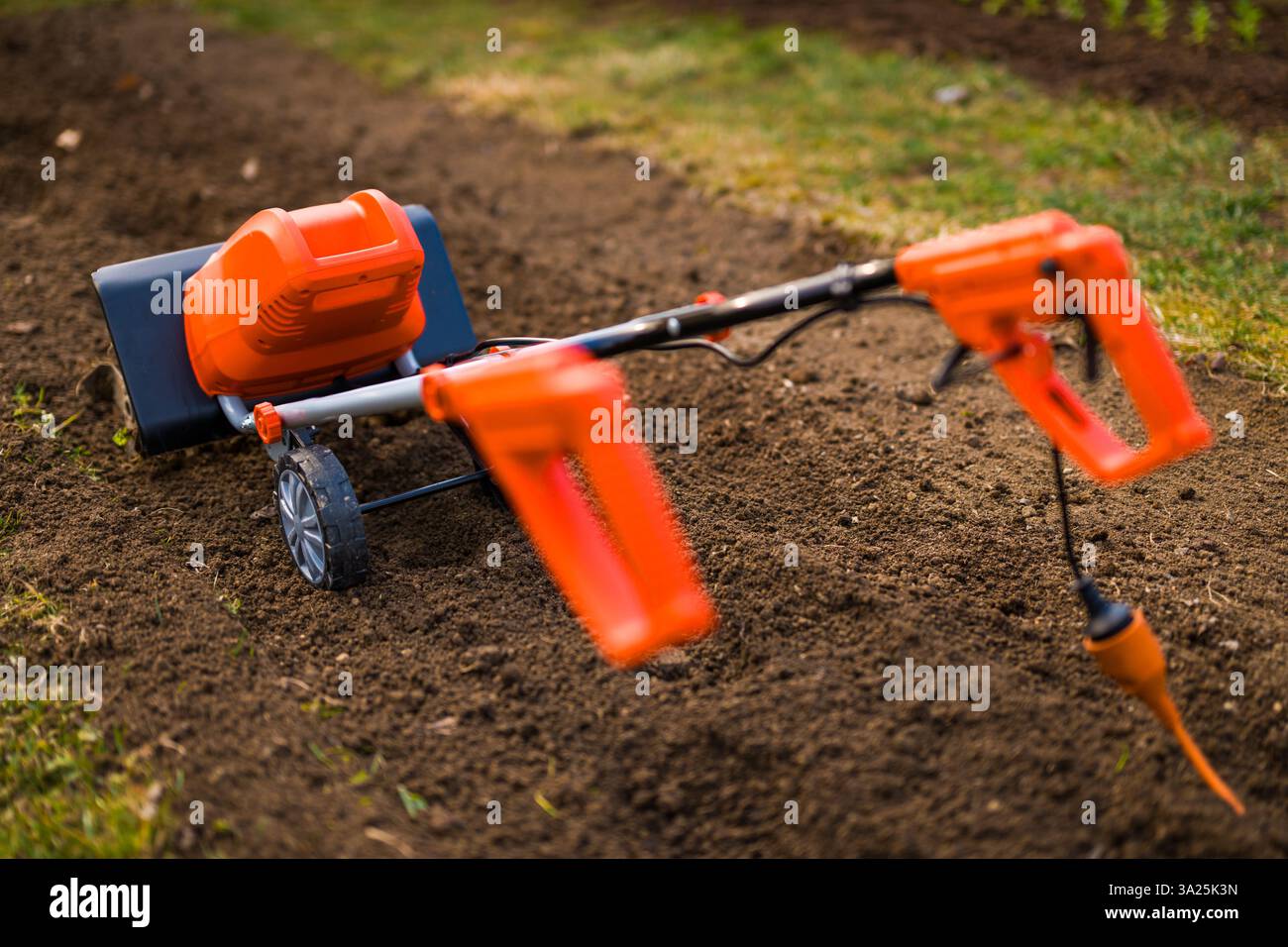 Garden tiller, rotavator or cultivator. Tillers break up compacted soil ...