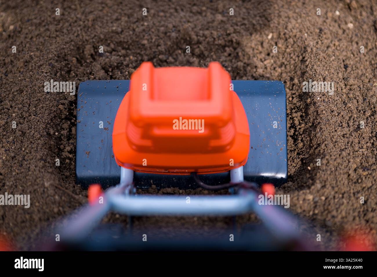 Garden tiller, rotavator or cultivator. Tillers break up compacted soil ...