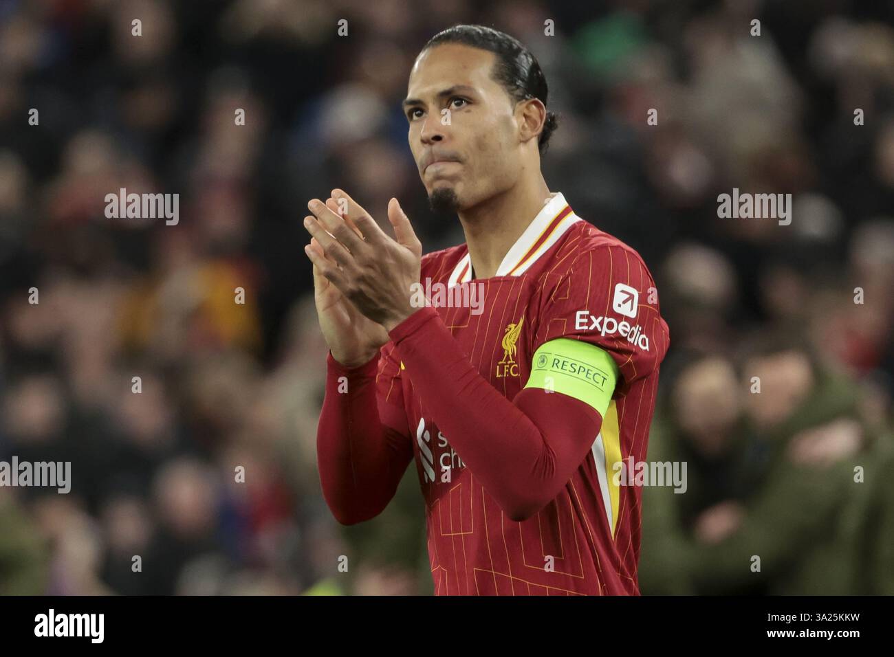 Virgil Van Dijk of Liverpool salutes the supporters following the ...