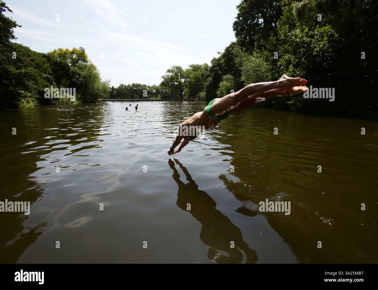 File photo dated 30/07/14 of a swimmer diving into the water at the ...