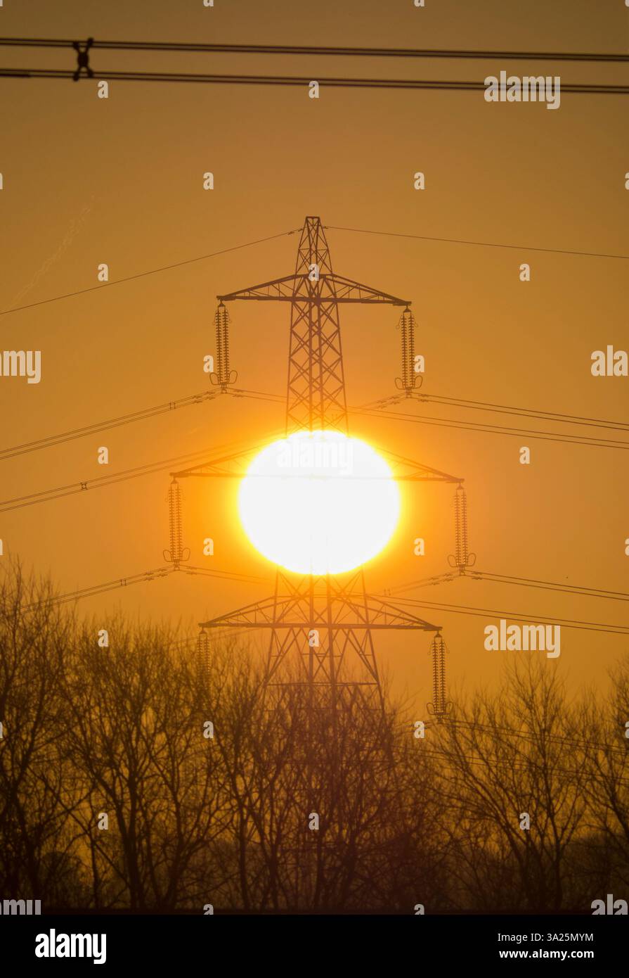 This beautiful and somewhat surreal scene of glowing skies and pylons ...