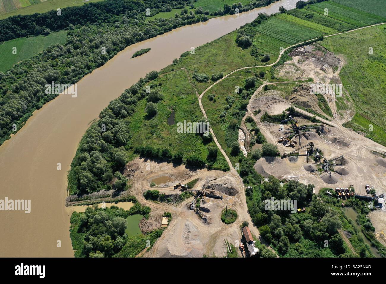 Aerial view of river sand and gravel exploitation, pit, quarry, ballast ...