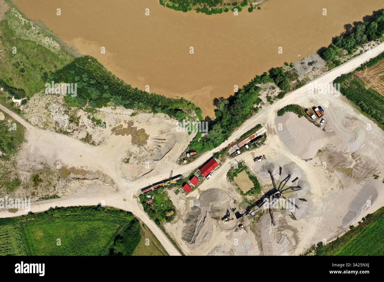 Aerial view of river sand and gravel exploitation, pit, quarry, ballast ...