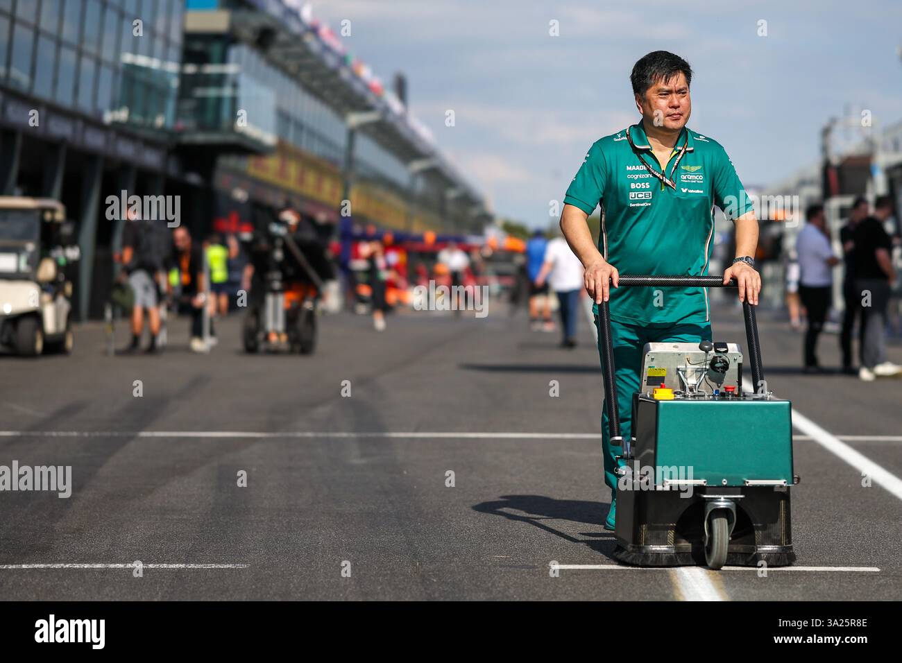 MELBOURNE, AUSTRALIA - MARCH 12: A Aston Martin mechanic during ...