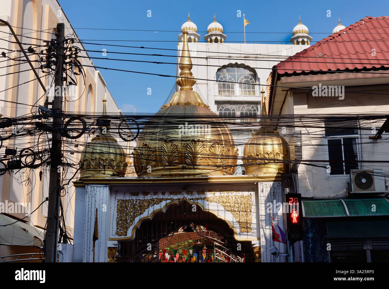 The entrance gate to Siri Guru Singh Sabha Gurdwara, a Sikh templa in ...