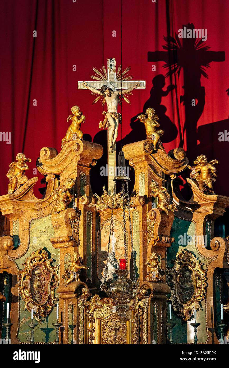 Golden Religious Altar with Crucifix and Dramatic Shadow on Red Curtain – Christian Art and ...