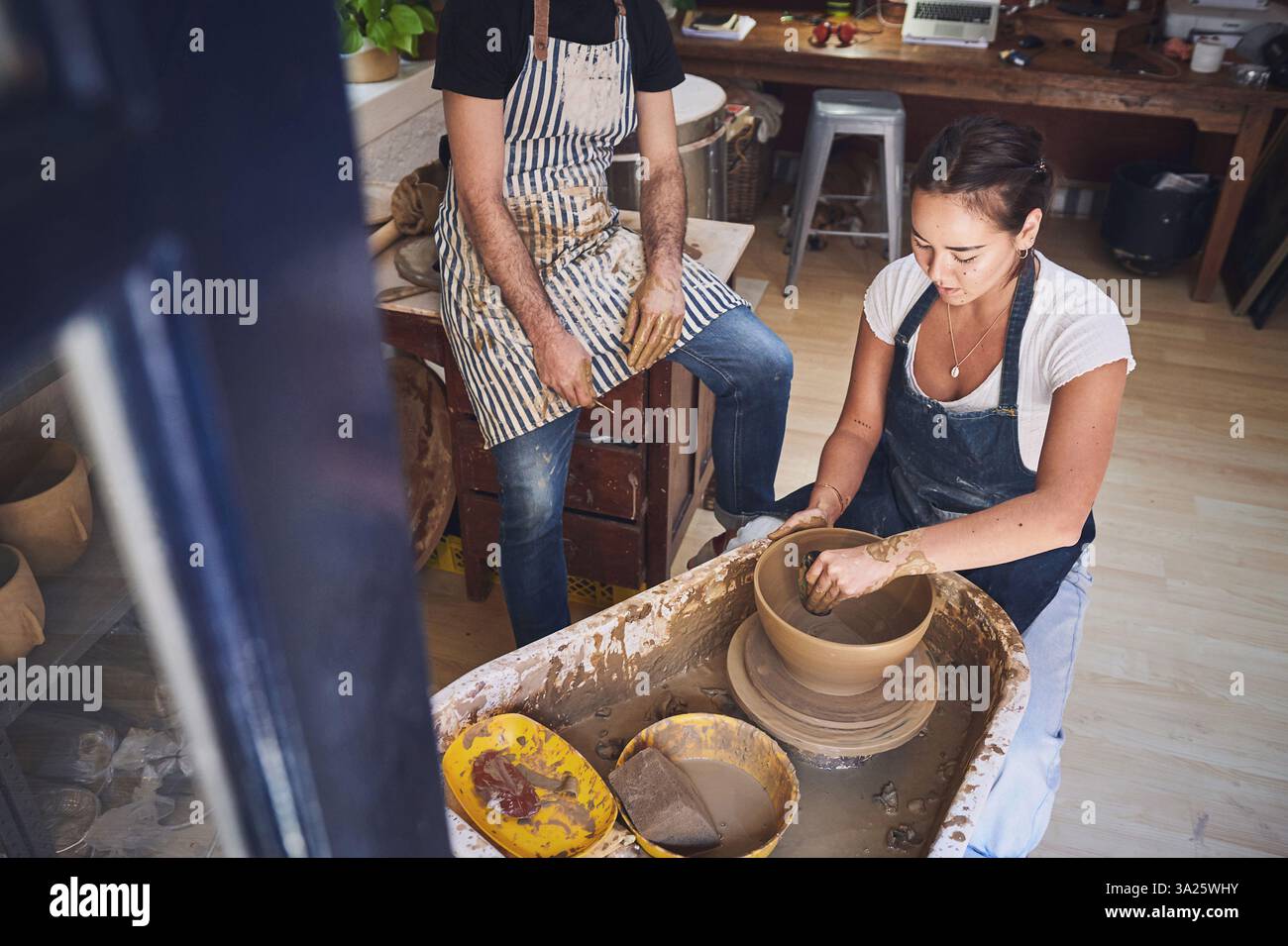 People, sculpture and bowl in pottery workshop for ceramic molding ...