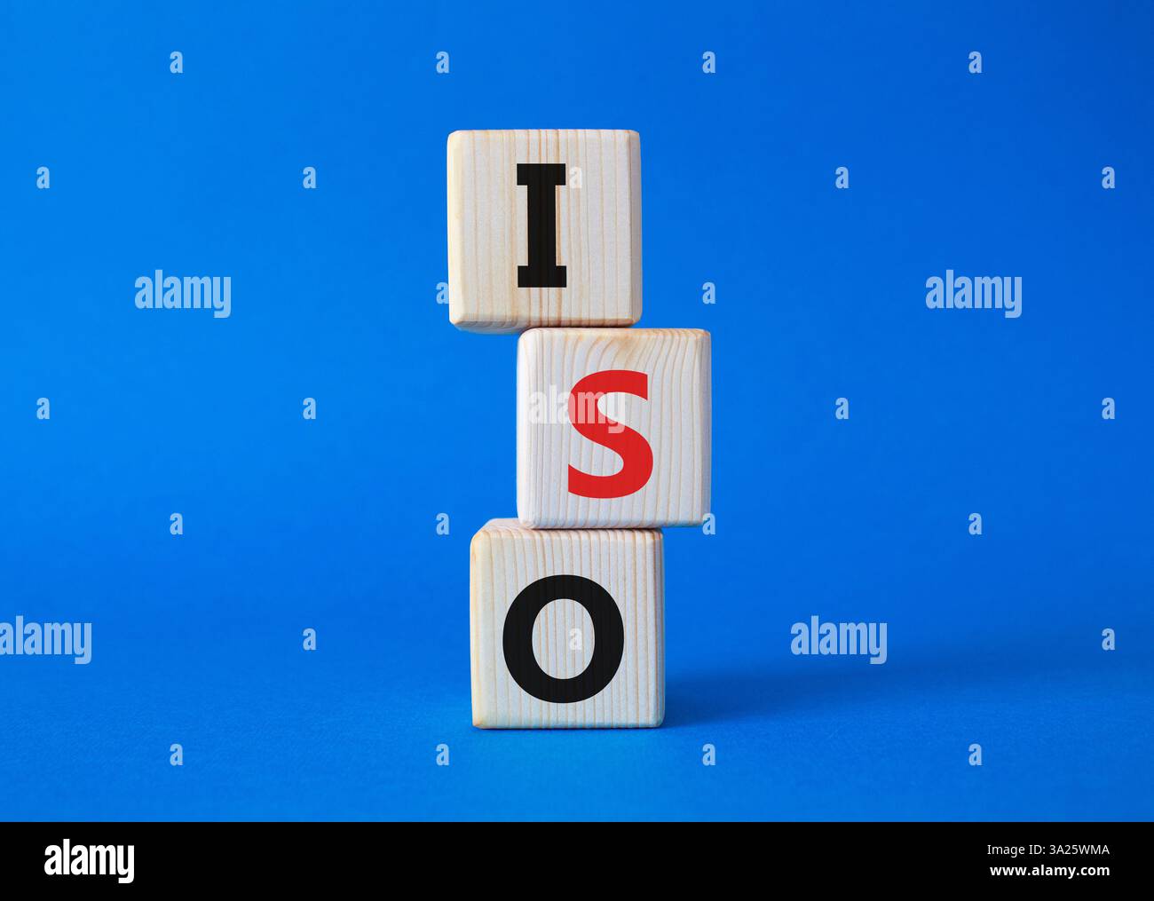 ISO standards quality control symbol. Concept word ISO on wooden cubes. Beautiful blue ...