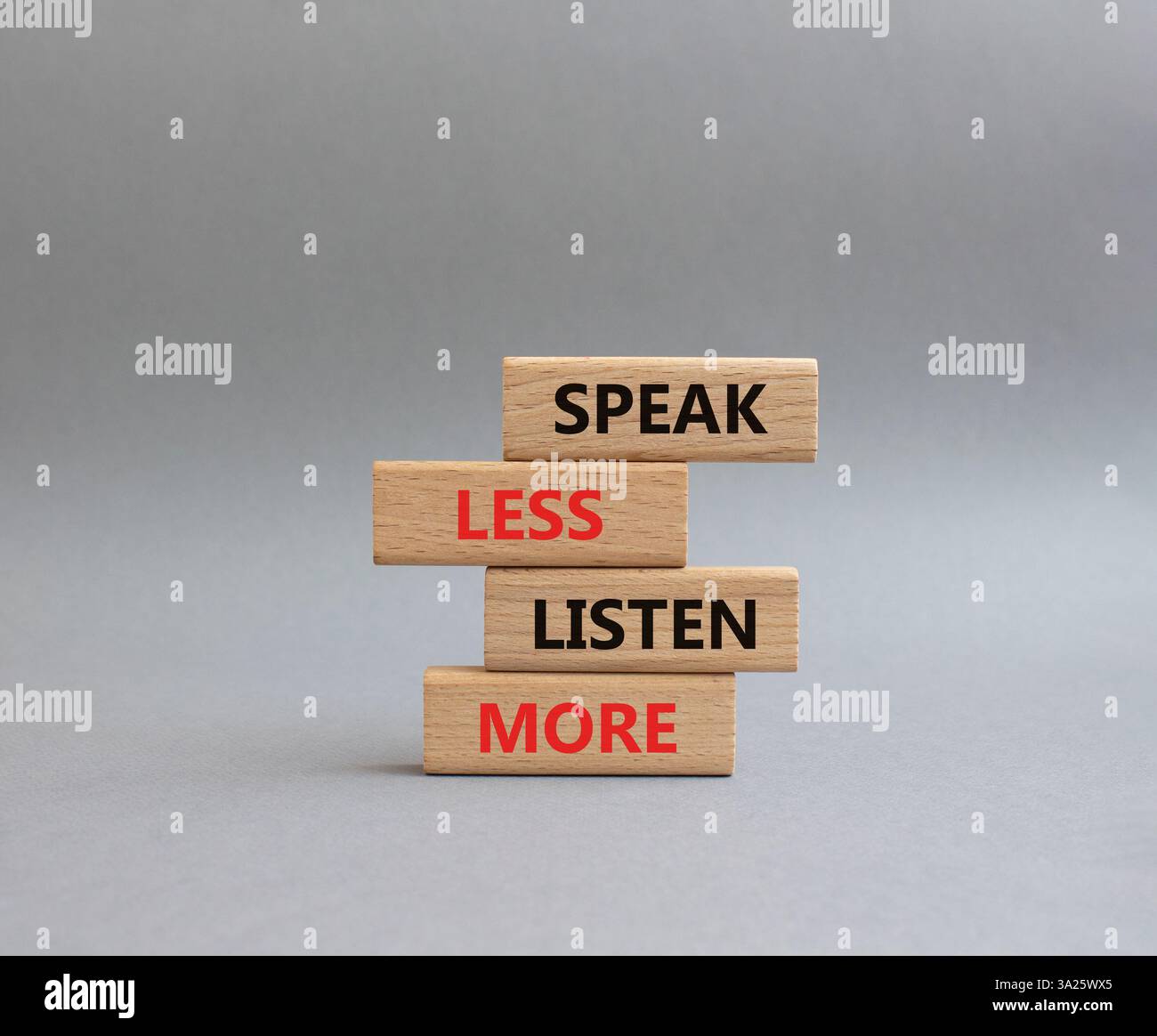 Speak less Listen more symbol. Wooden blocks with words Speak less ...