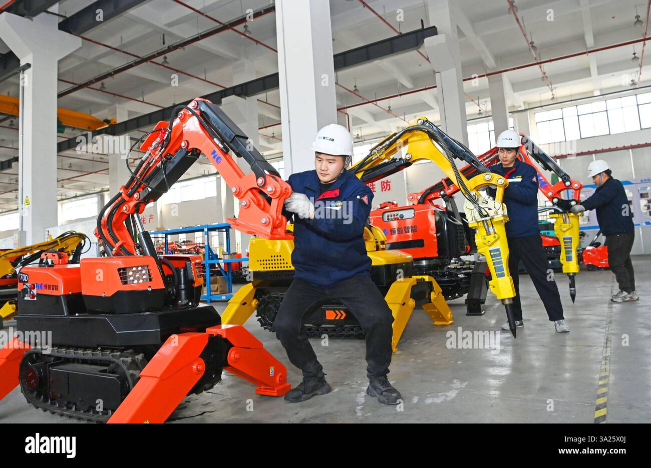 CHUZHOU, CHINA - MARCH 11, 2025 - Technicians install and commission an intelligent industrial ...