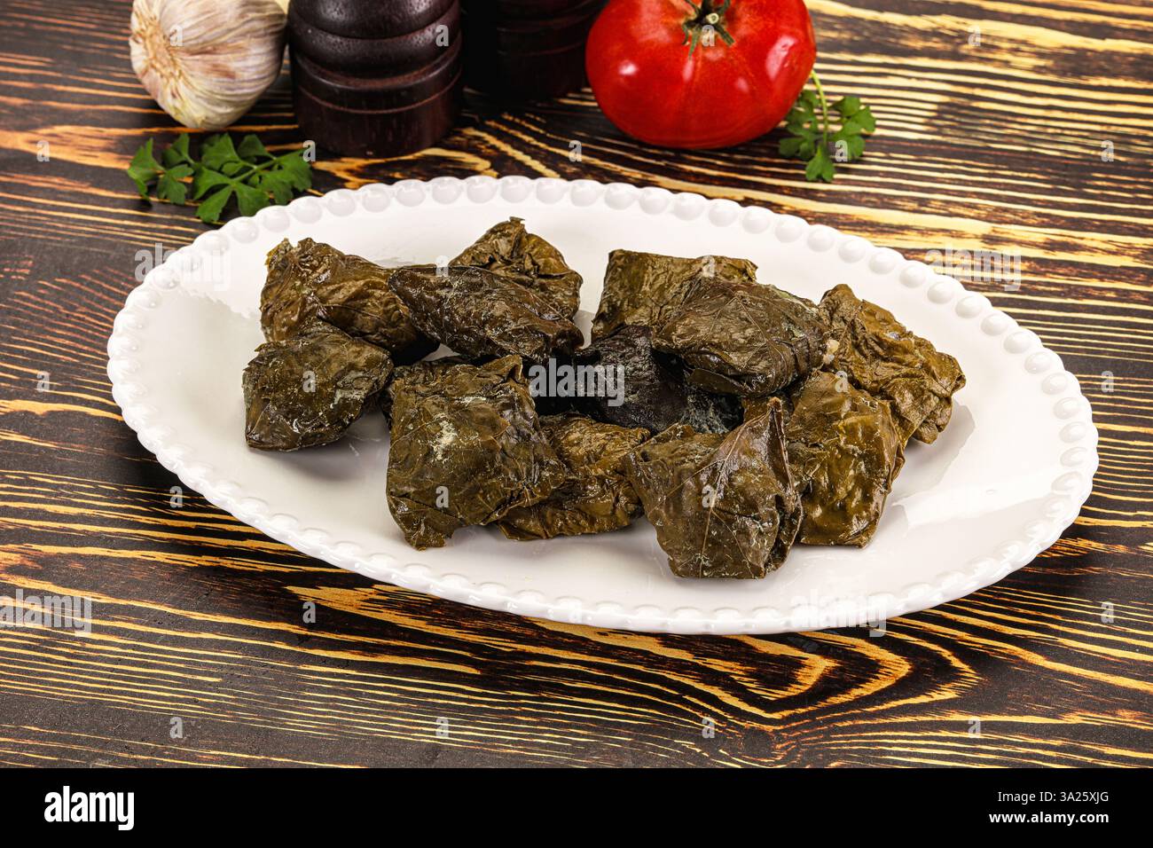 Stuffed dolma - various meat in grape leaves Stock Photo - Alamy