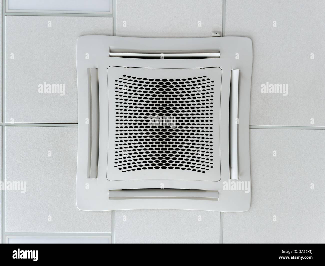 Close-up view of a large room cassette type ceiling air conditioner ...