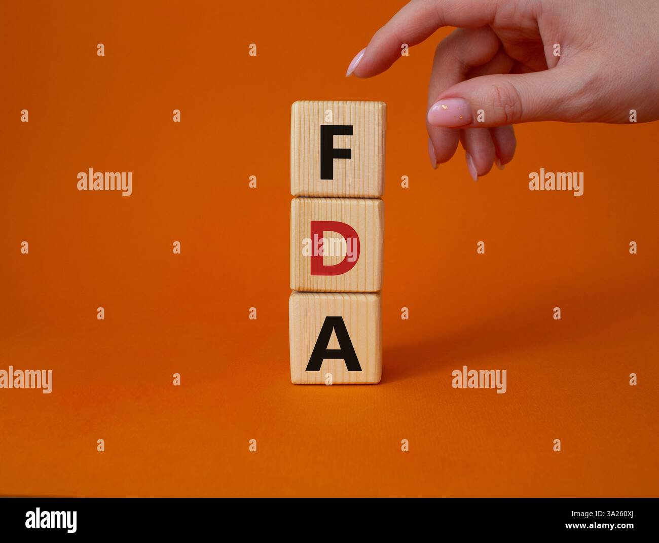 FDA - Food Drug Administration symbol. Wooden cubes with word FDA ...