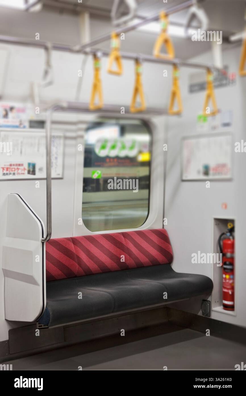 Empty seat on subway train, Tokyo, Japan Stock Photo - Alamy