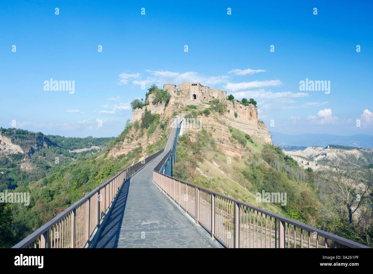 Bridge to the hilltop historic buildings of the fort of Civita di ...