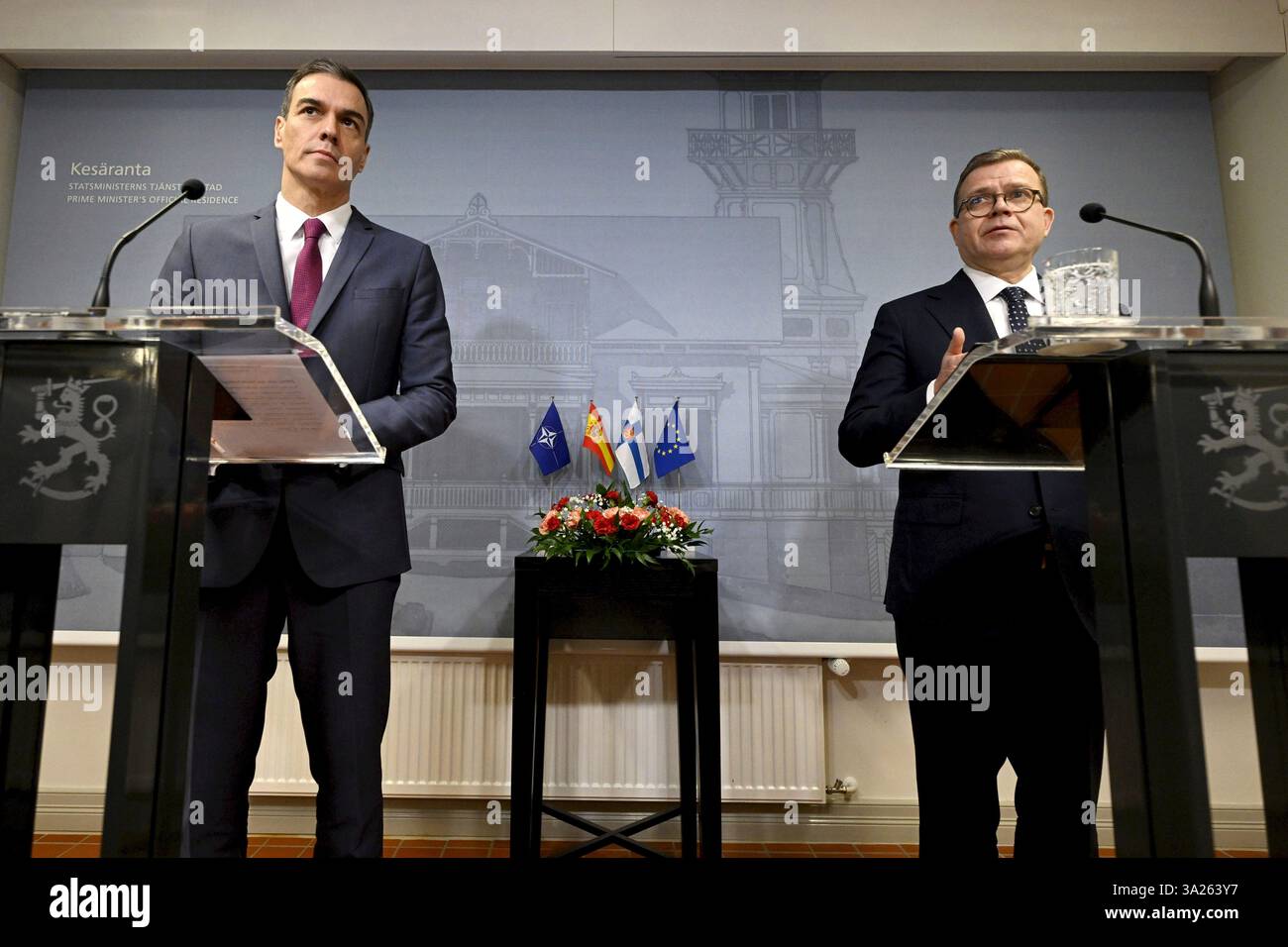 Spanish Prime Minister Pedro Sanchez, left, and Finnish Prime Minister Petteri Orpo attend a ...