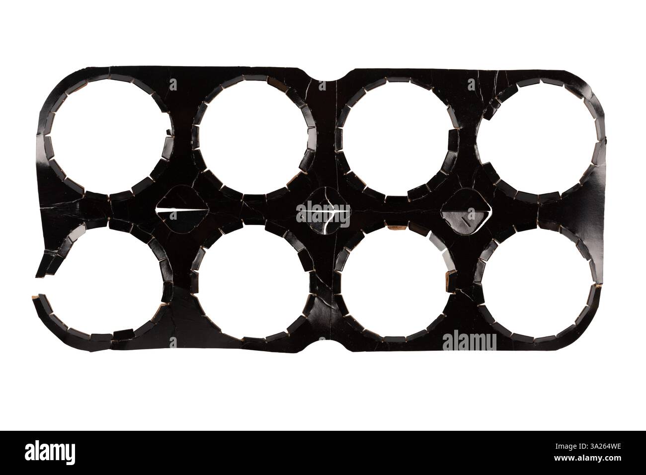 Used black cardboard can holder isolated on white background cutout ...