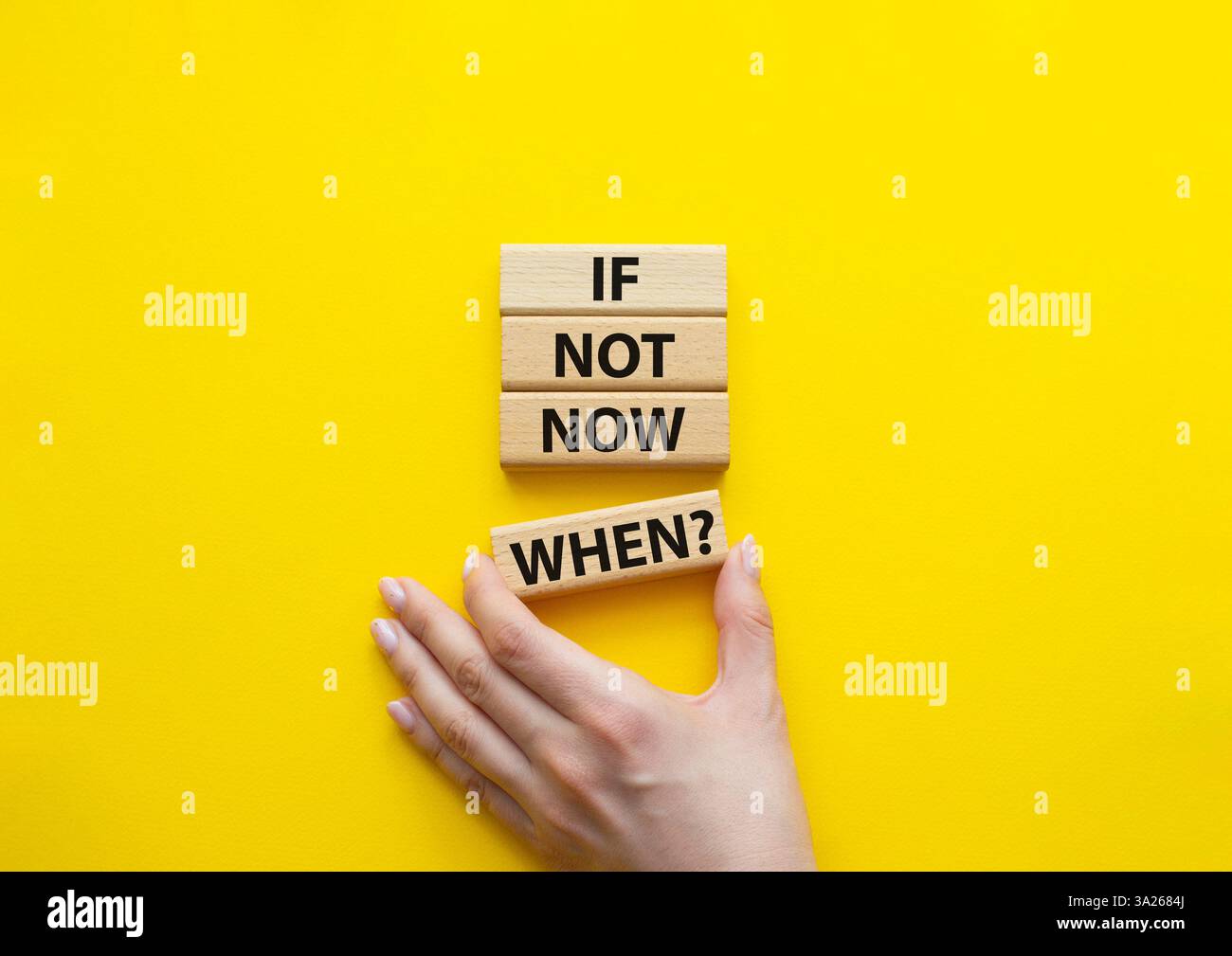 If not now when symbol. Concept words If not now when on wooden blocks ...