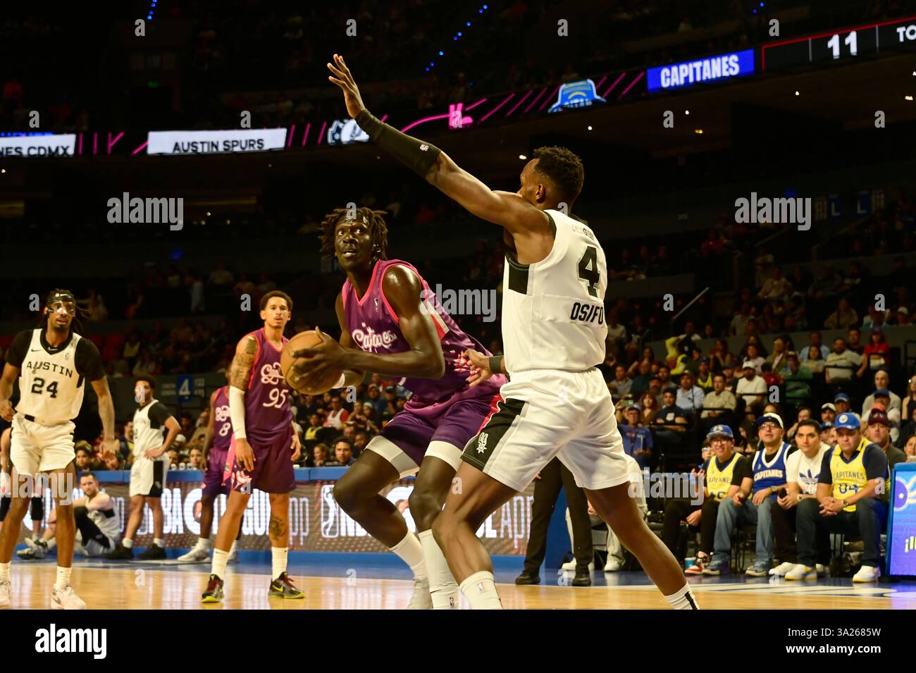 Akoldah Gak #13 of Mexico City Capitanes drives to the basket against ...