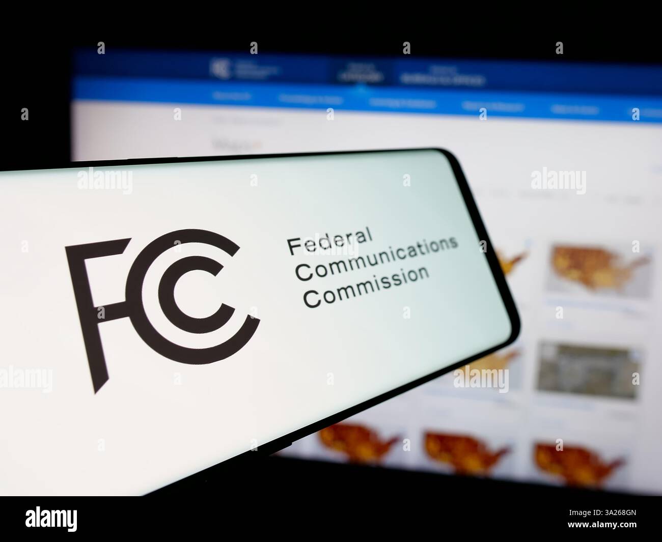 In this photo illustration, a smartphone with the logo of US agency ...