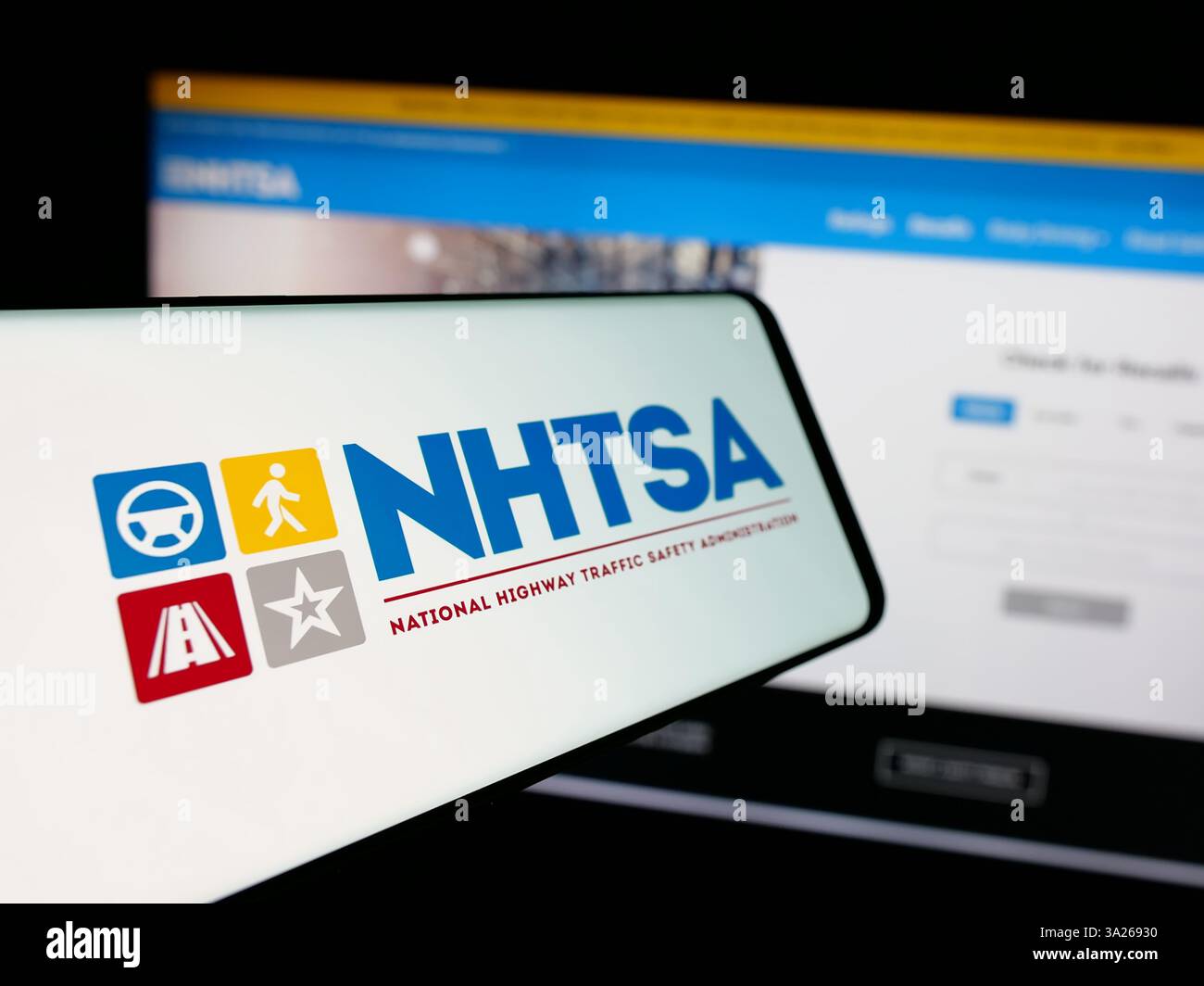 In this photo illustration, a mobile phone with the logo of National ...