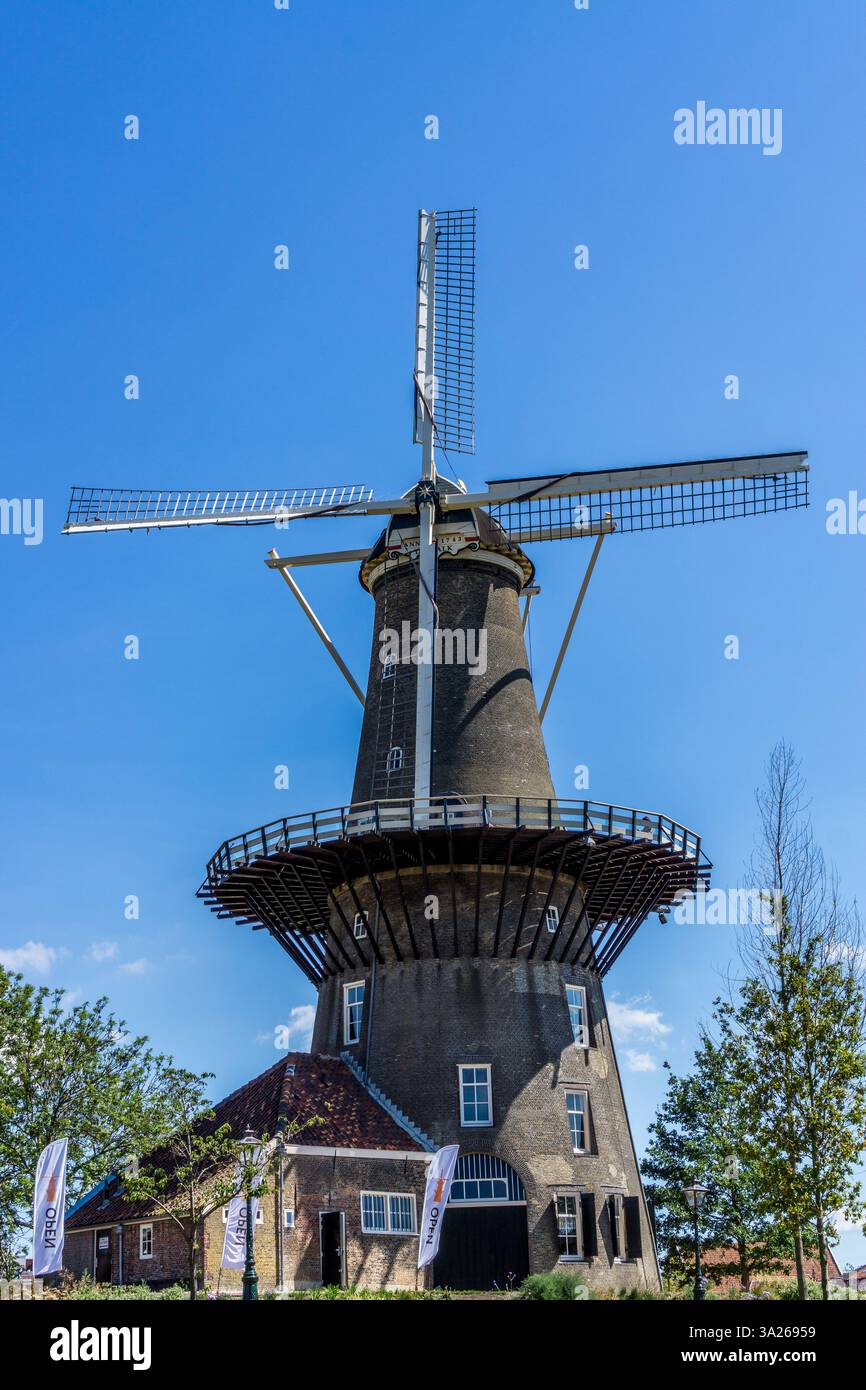 Molen (windmill) de Valk in Leiden, The Netherlands, on a bright sunny ...