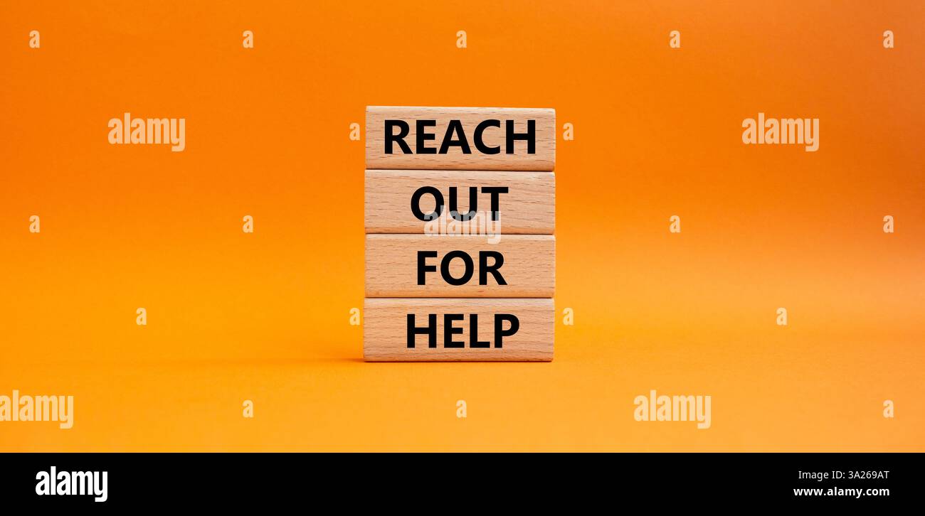 Reach out for help symbol. Wooden blocks with words Reach out for help ...