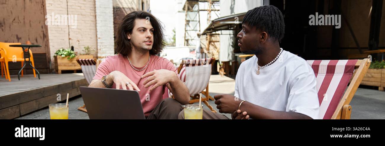 Two handsome men share laughs and deep conversations while enjoying ...