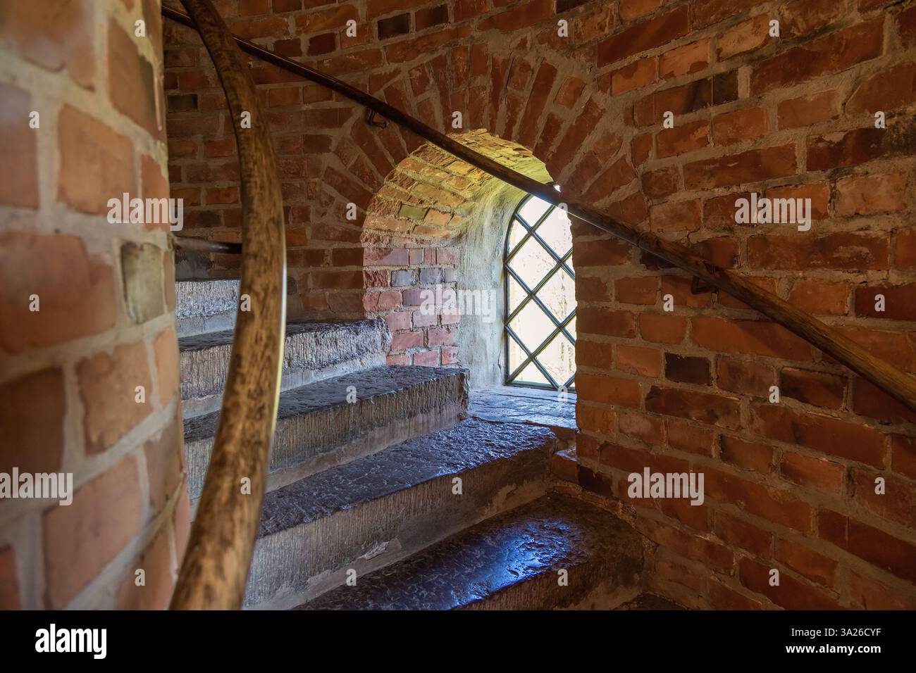 Window niche by the stairs in an old tower of bricks Stock Photo - Alamy
