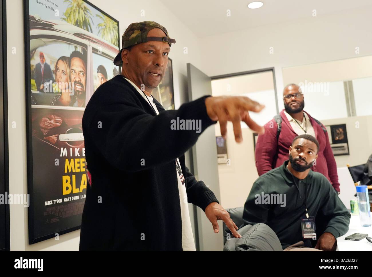 Filmmaker and former professional basketball player Deon Taylor, left ...