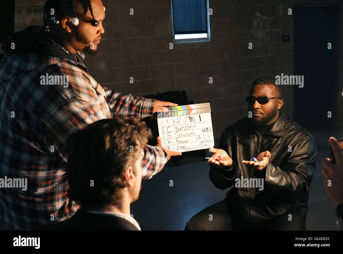 Pro Athletes Filmmaking NFL player Dion Dawkins, left, holds out the ...