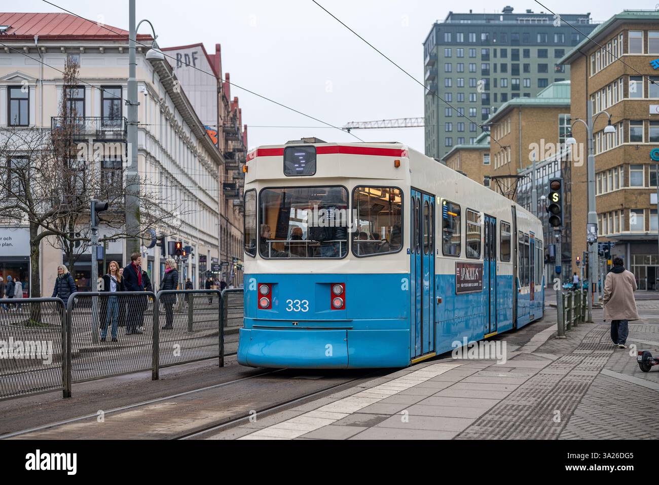The iconic blue trams of Gothenburg on a cloudy day in early March 2025 ...