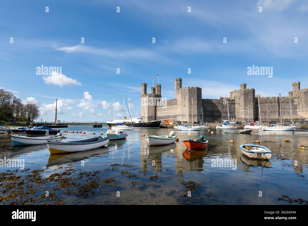 Caernarfon castle beside the river Seiont in the historic town of ...