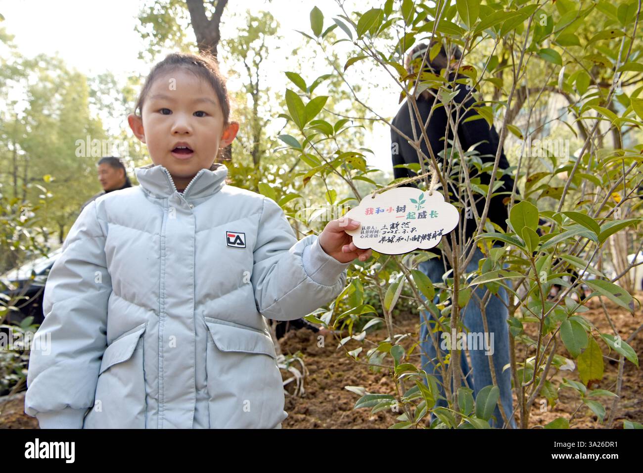 Children and parents plant trees in Huainan City, east China's Anhui ...