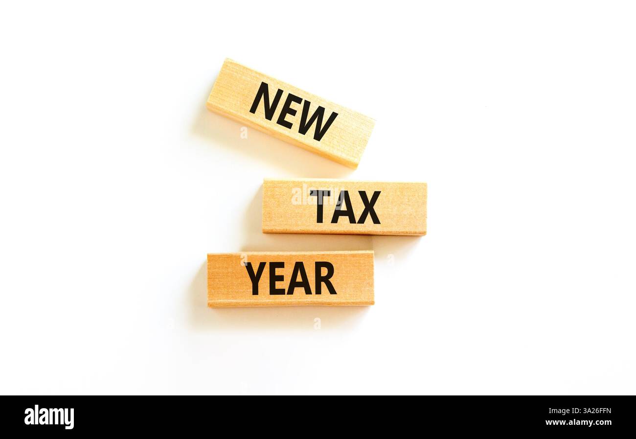 New tax year symbol. Concept words New tax year on beautiful wooden ...