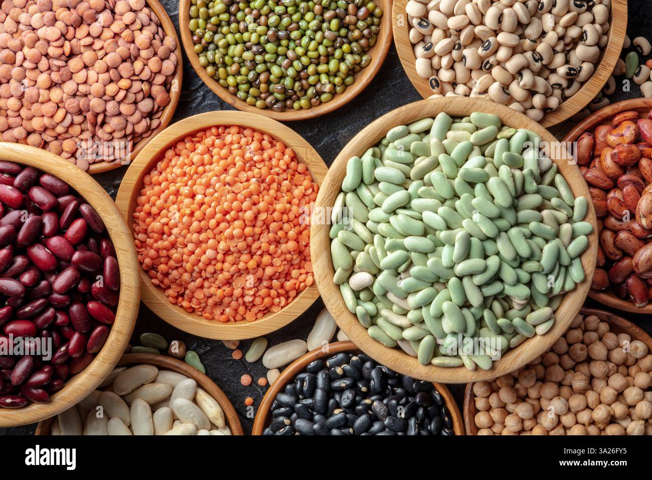 Various legumes, overhead flat lay shot. Many different pulses, an ...