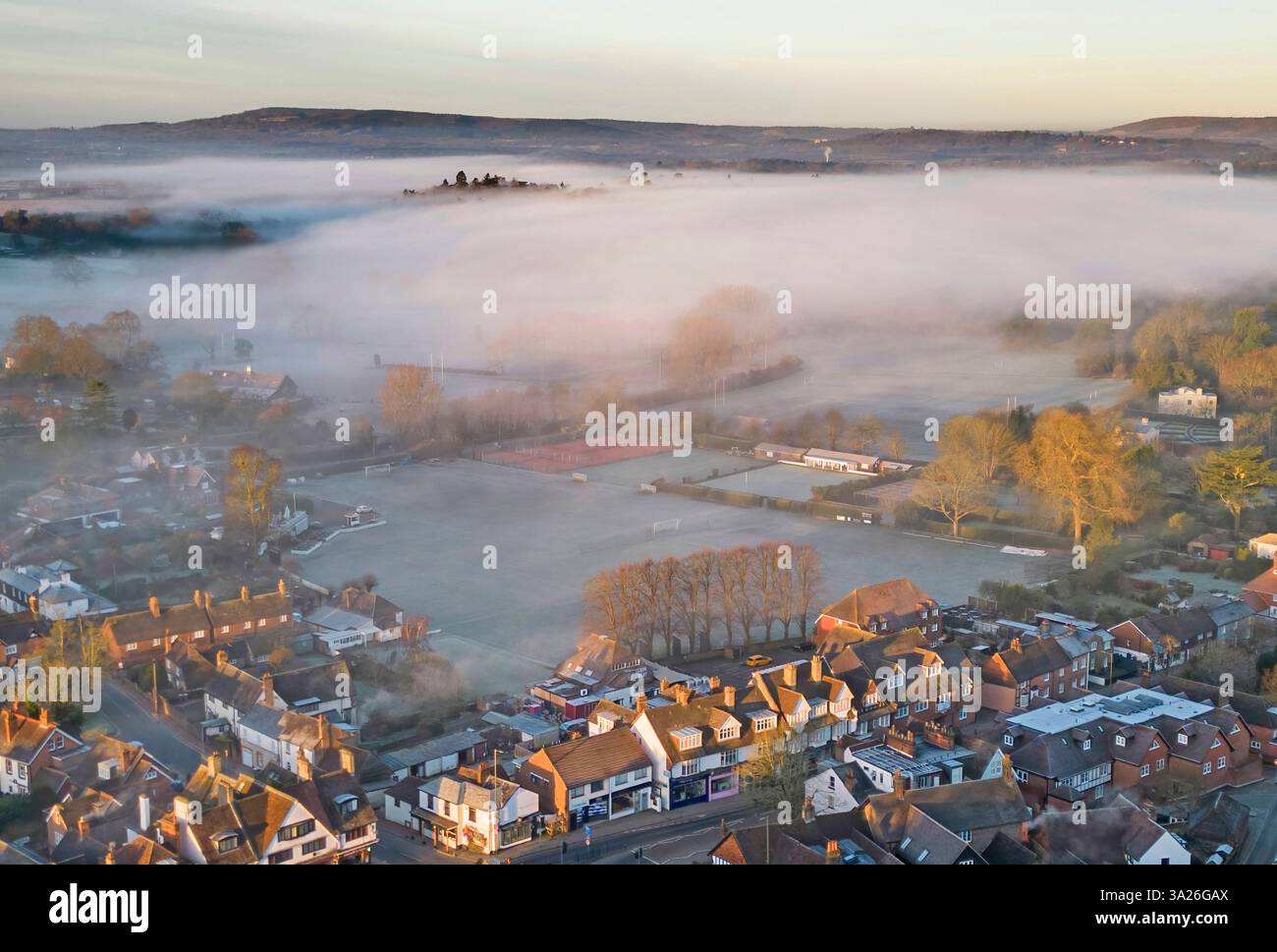 aerial view of low mist from the keep at reigate castle on a frosty ...