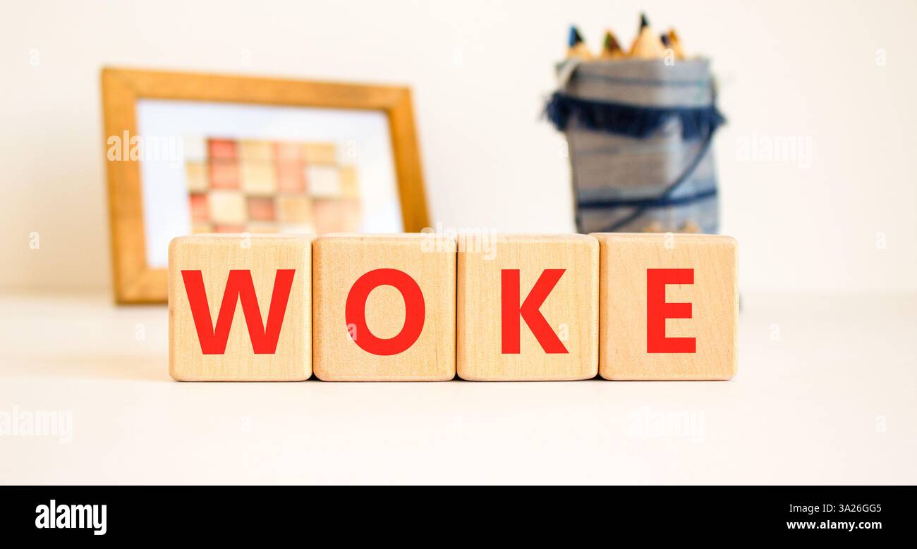 Woke question symbol. Concept word Woke question on beautiful wooden ...