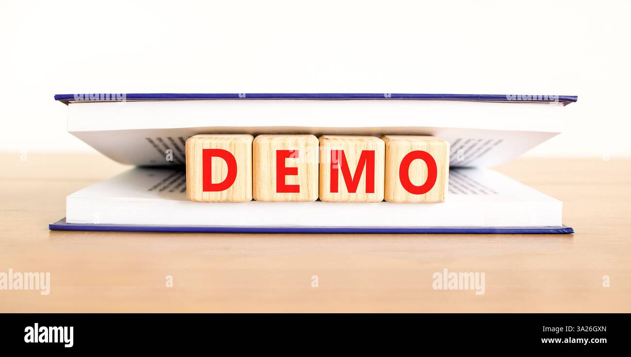 Demo symbol. Concept word Demo on beautiful wooden blocks in book ...