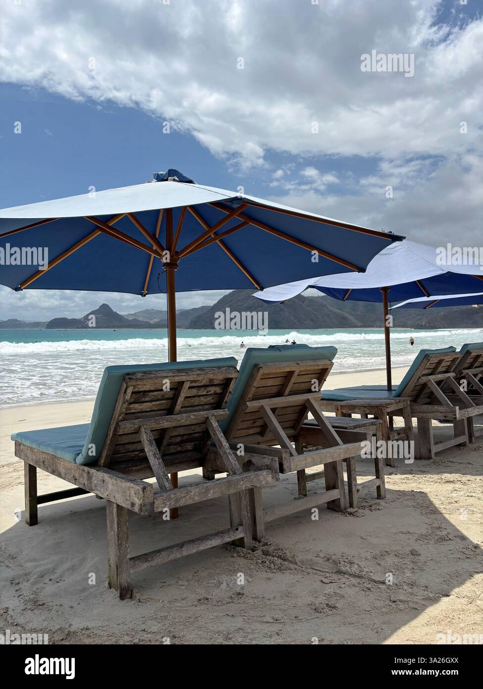 Beach Parasols and Loungers at Selong Belanak, Lombok Stock Photo - Alamy