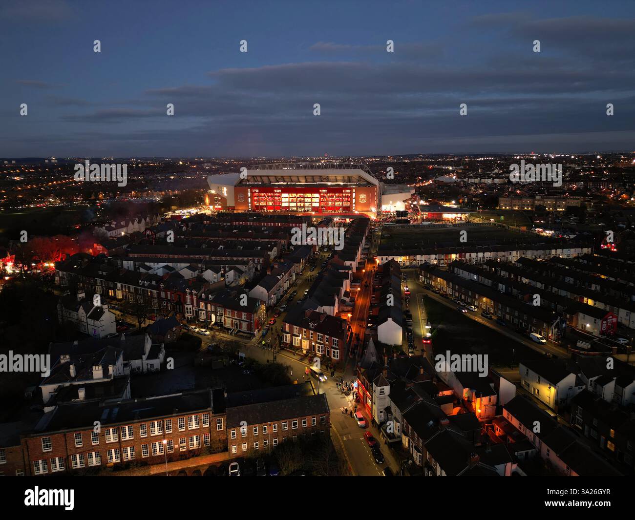 Aerial night view of Anfield Stadium, home of Liverpool FC, glowing ...