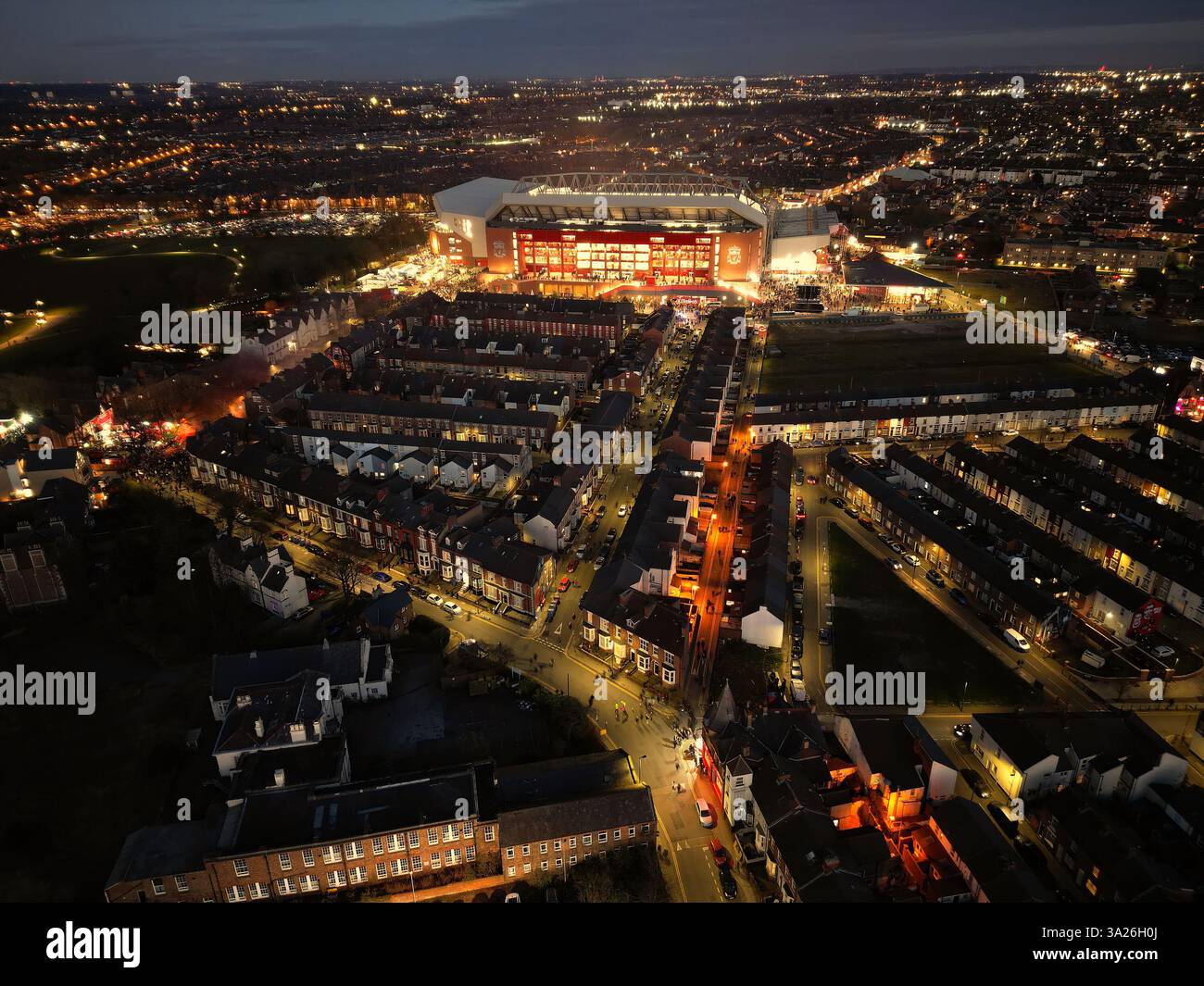 Aerial night view of Anfield Stadium, home of Liverpool FC, glowing ...
